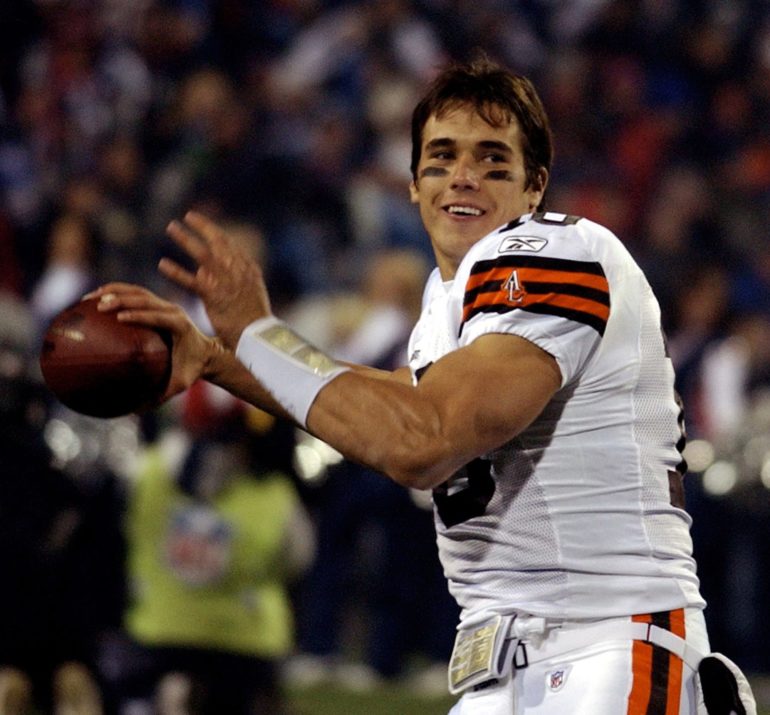 Cleveland quarterback Quinn warms up during a NFL football game against ...
