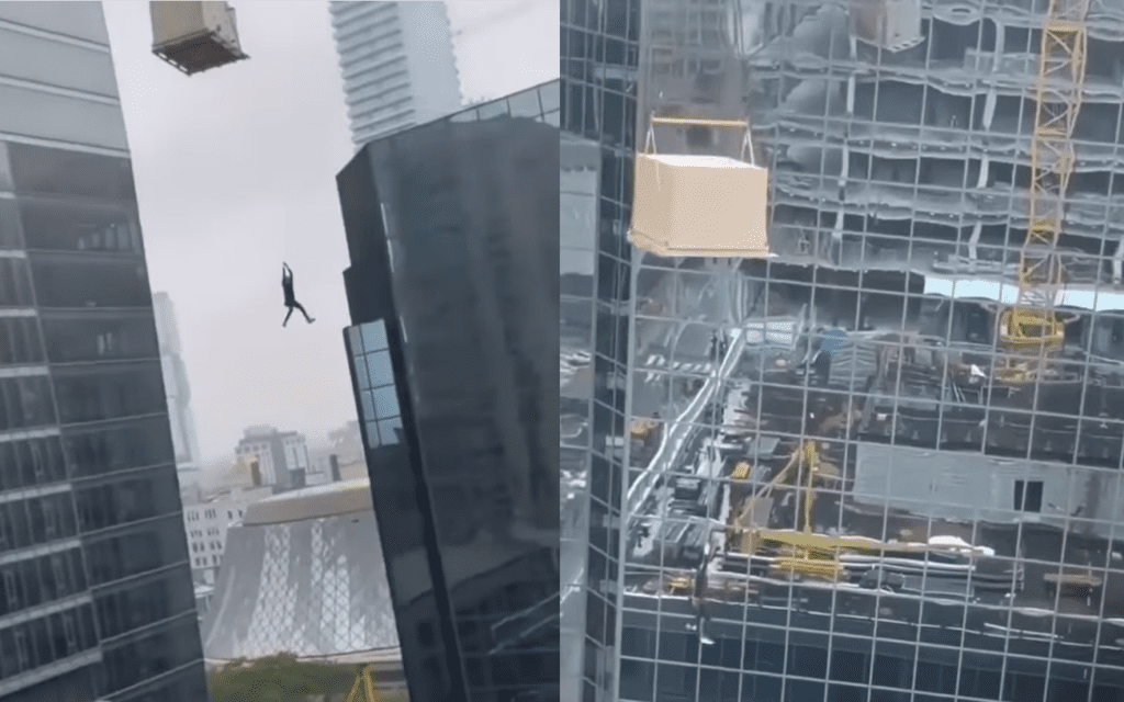 Construction Worker Dangles From A Crane, Up 30 Stories In The Air, In ...
