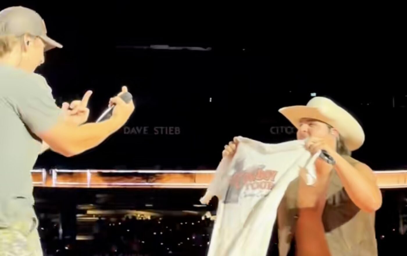 Morgan Wallen Flips Off A Charley Crockett T-Shirt (Held By Gavin ...